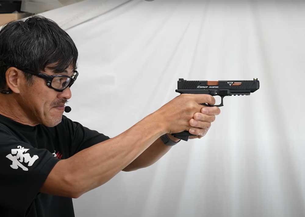 Mach Sakai With The EMG Combat Master Omega GBB Pistol | Popular ...